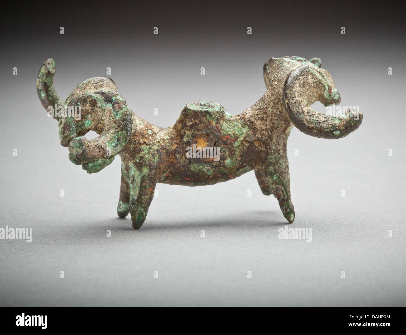 This pendant from the LACMA collection is crafted from bronze and ...