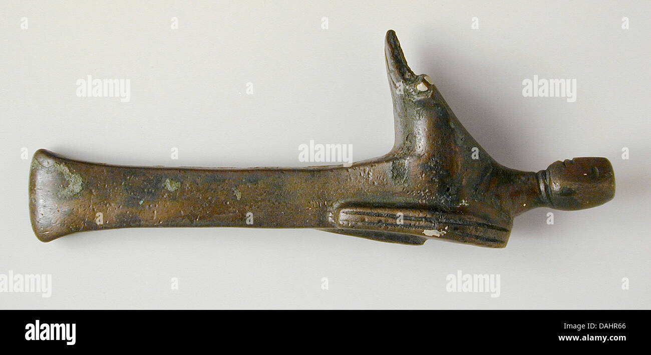 This pickaxe, a tool of historical significance, is crafted from bronze ...