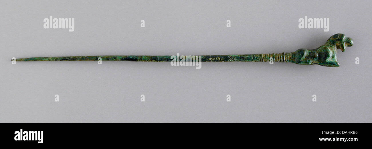 A decorative pin from the museum's collection, showcasing intricate ...