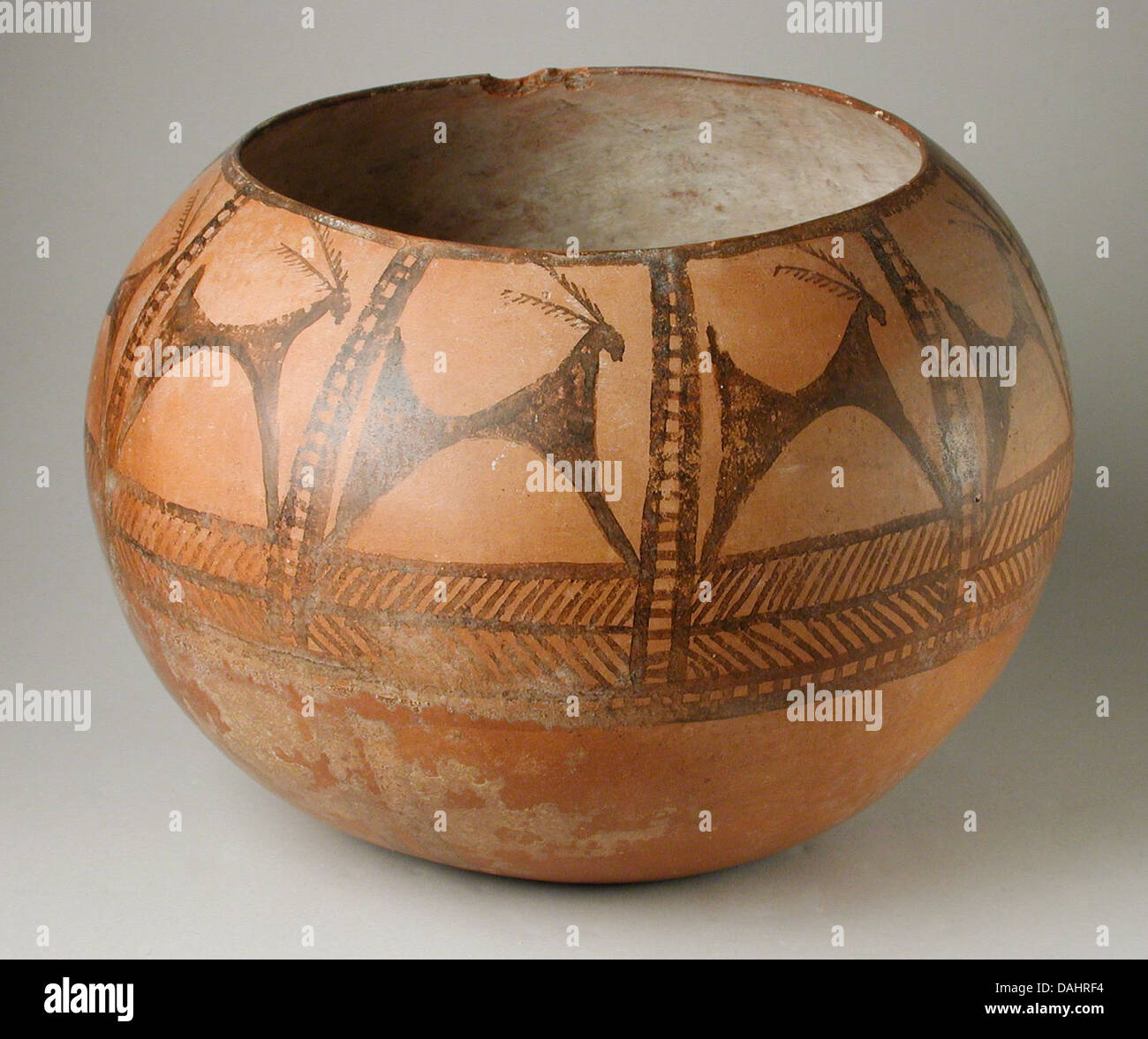 A prehistoric painted pottery vessel, showcasing early human ...