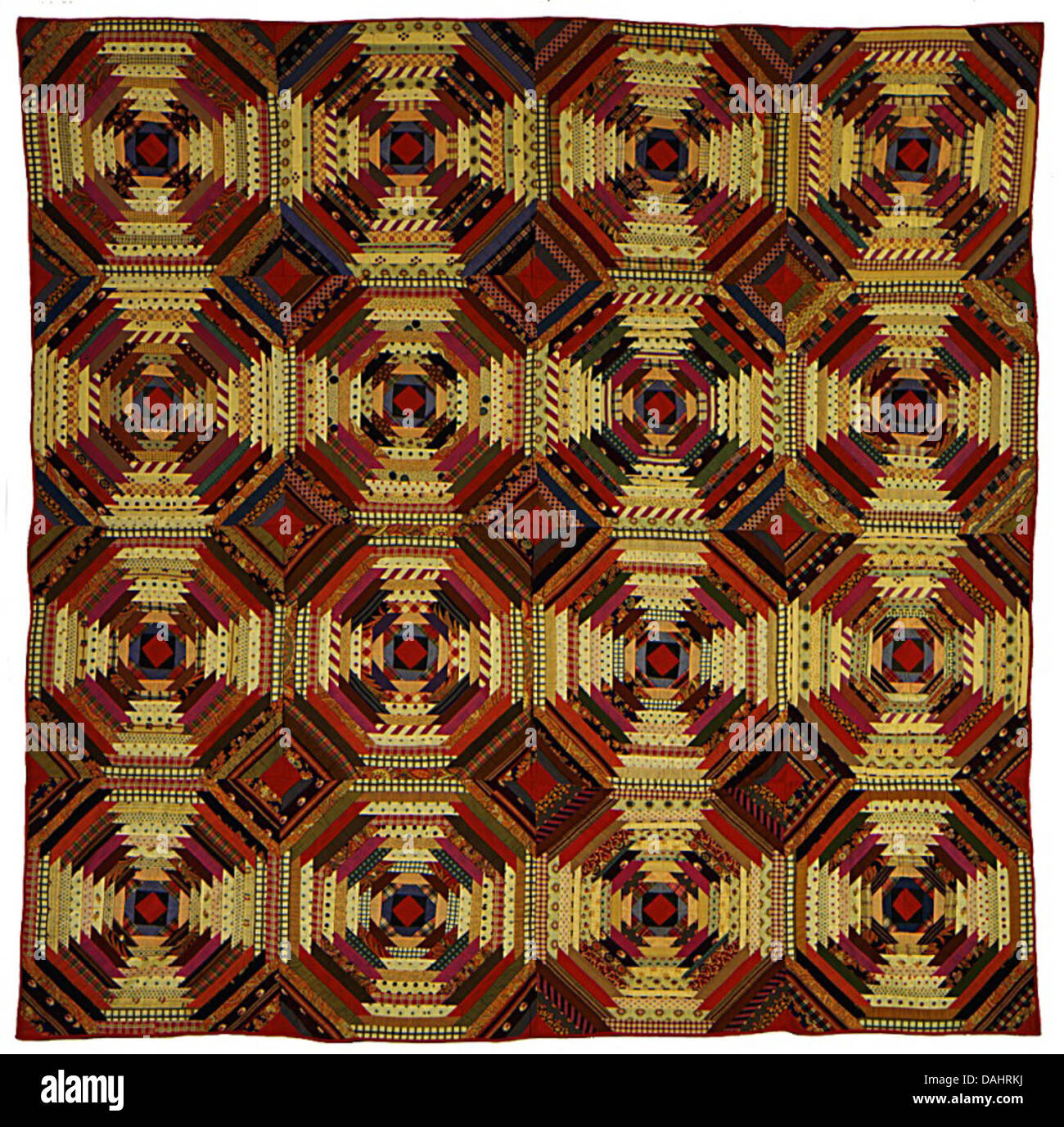 This quilt, known as the 'Log Cabin' pattern in the 'Pineapple ...