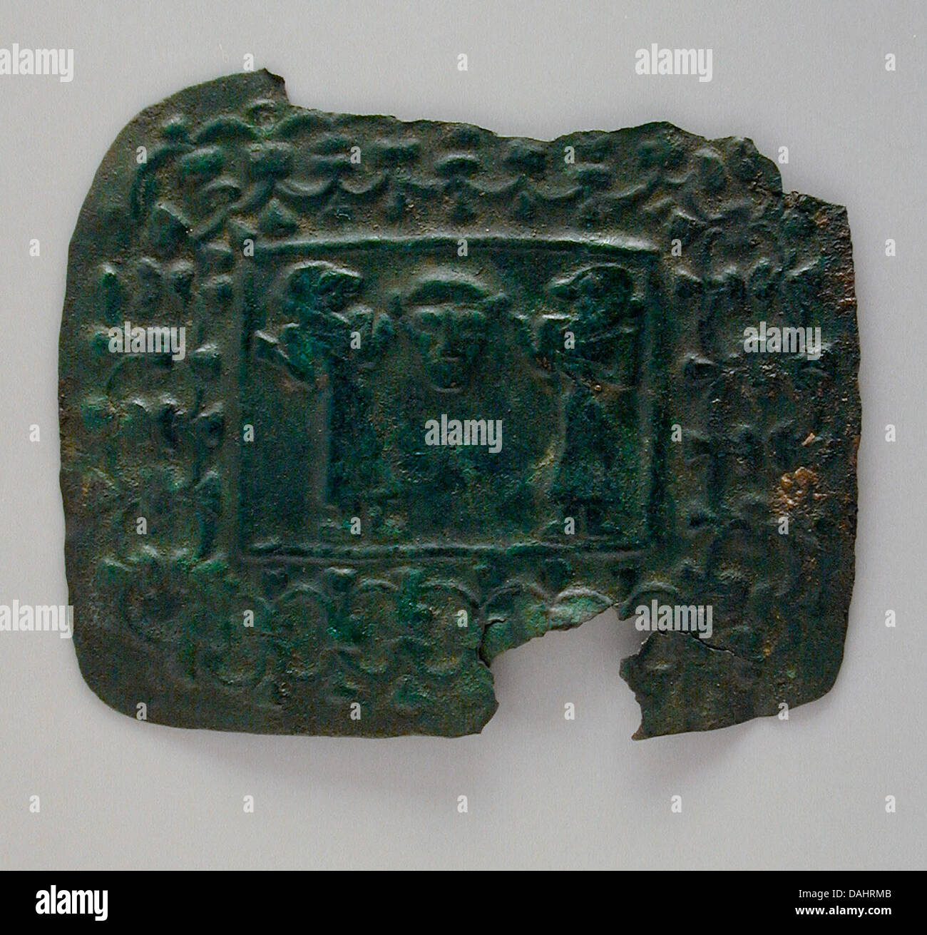This rectangular plaque is a detailed artifact, often used as a ...