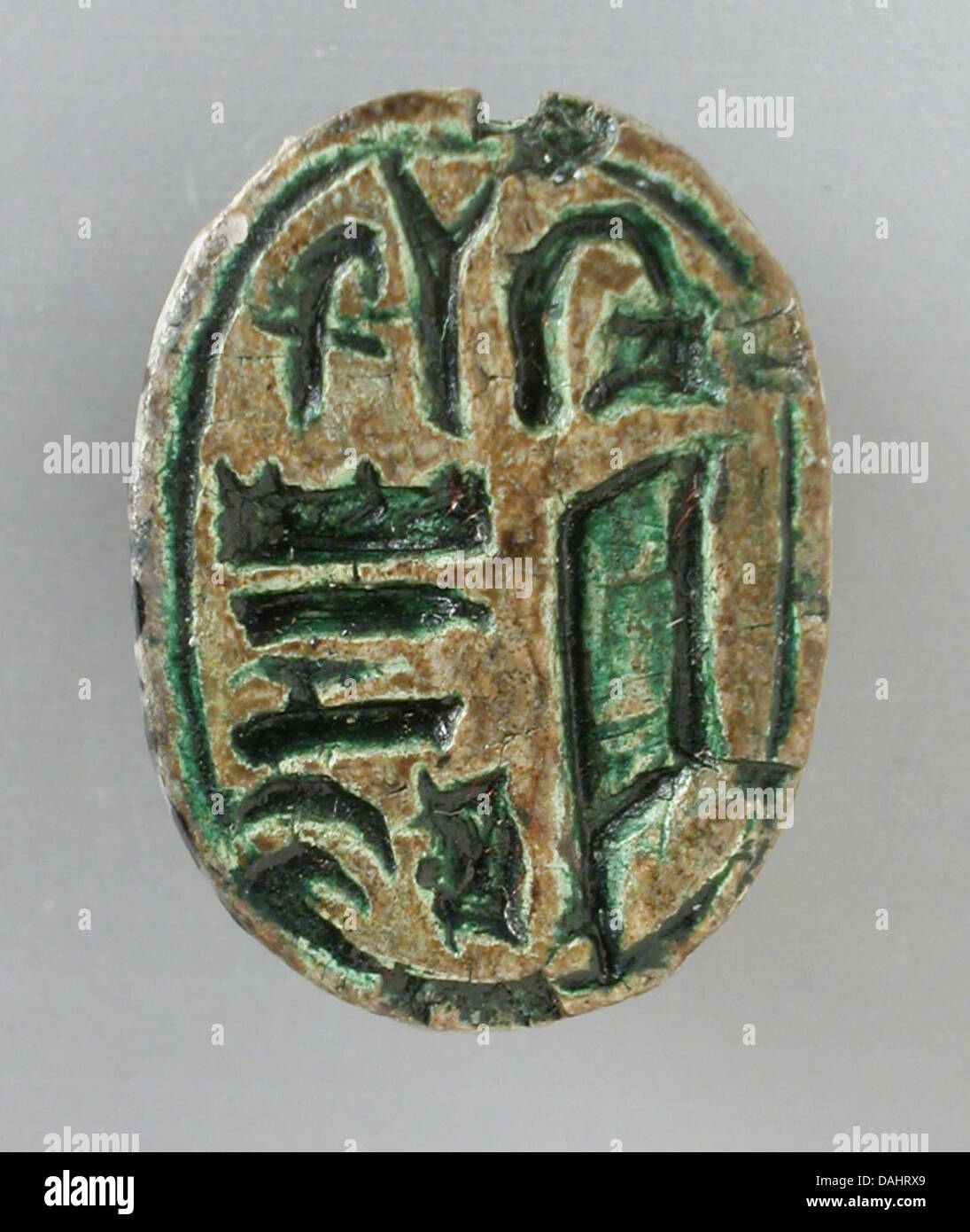 This scarab, belonging to the royal scribe Amenhotep, is a significant ...