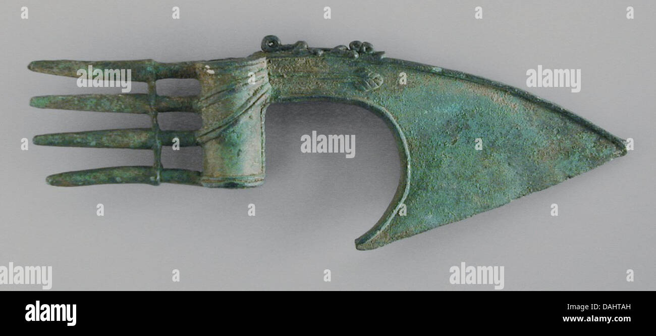 This artifact, displayed at LACMA, is an axehead with a shaft-hole ...