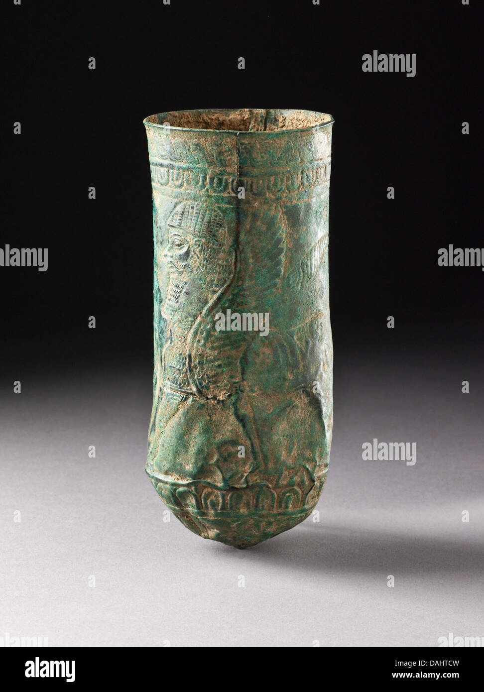 A situla from ancient times, crafted in metal, showcasing a detailed ...