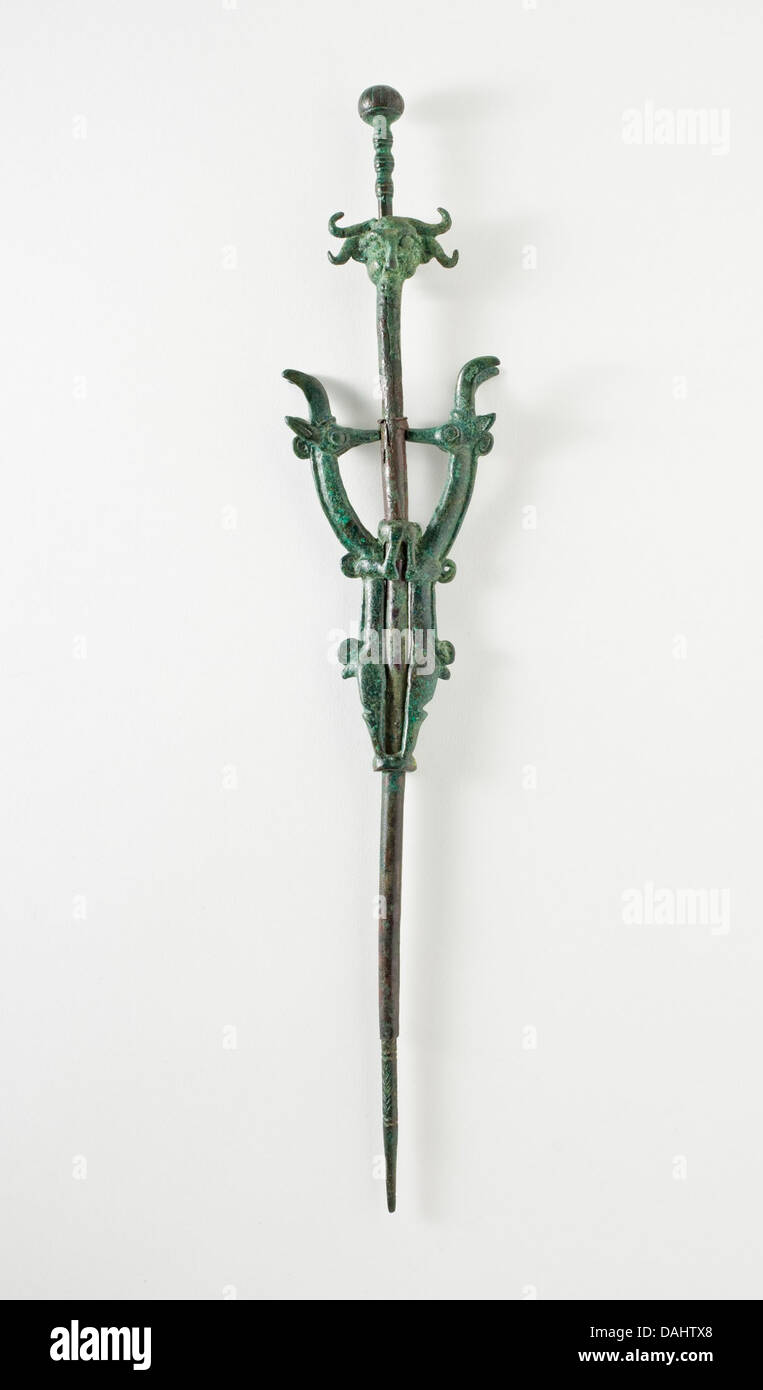 A standard finial, crafted in metal, reflecting the artistic style and ...