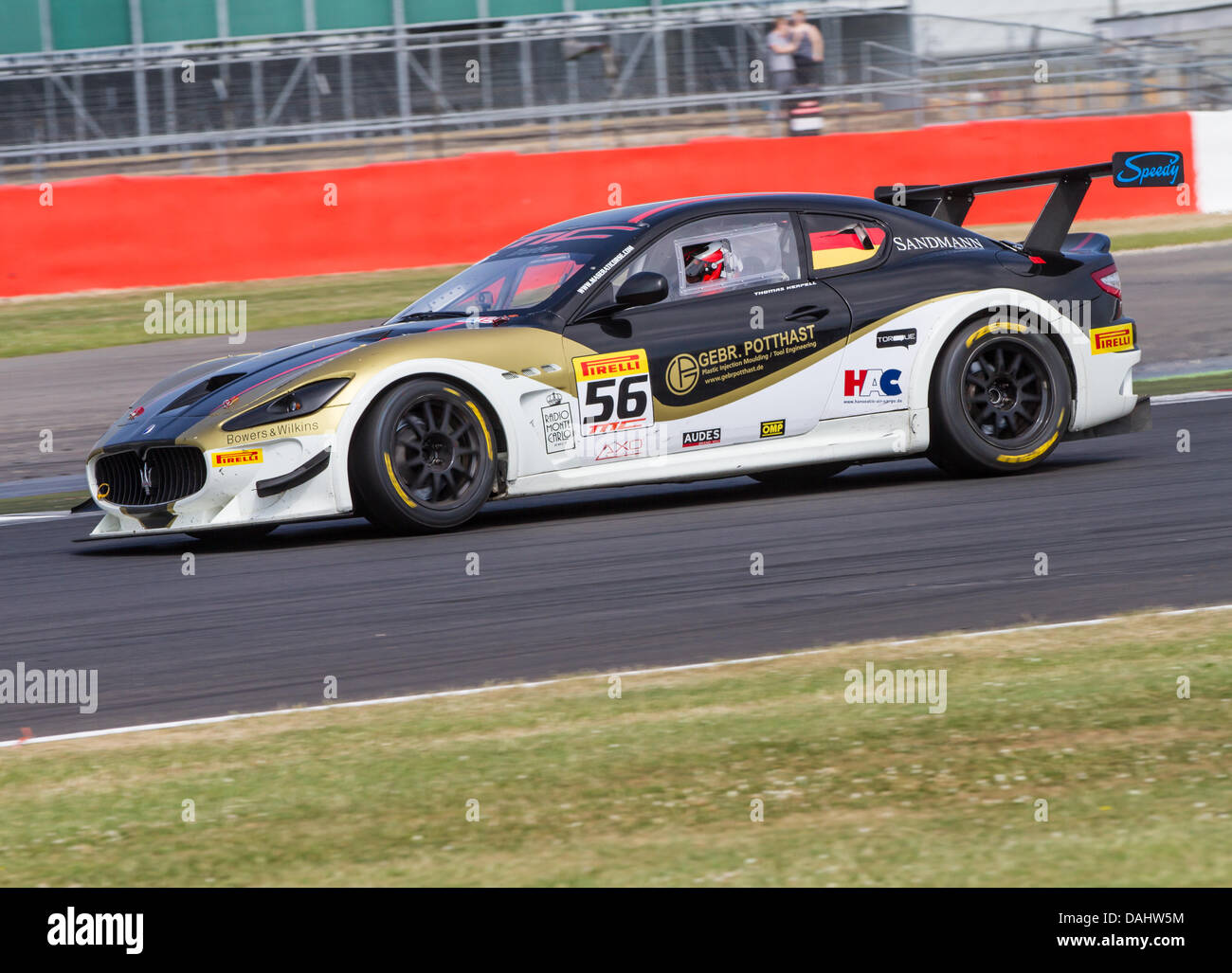 Maserati's racing round the Silverstone track during the Maserati ...