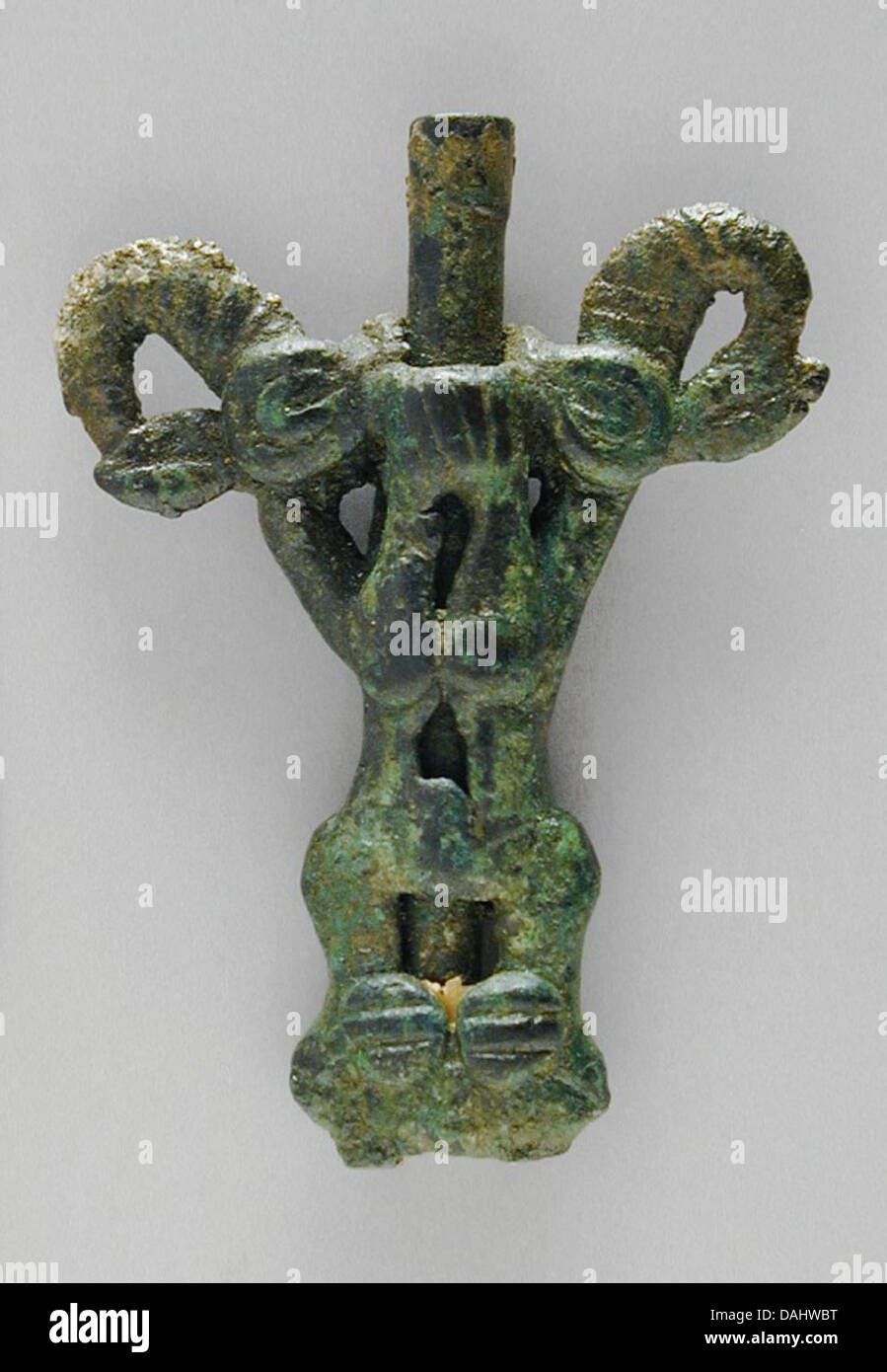 This standard finial is an ornamental metal piece, likely from a ...