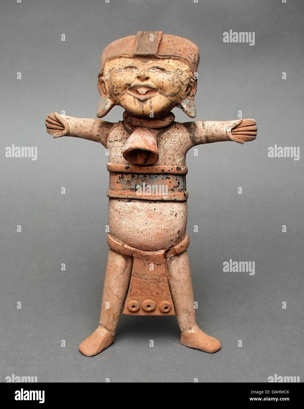 This standing figure, cast in bronze, represents an ancient statue ...