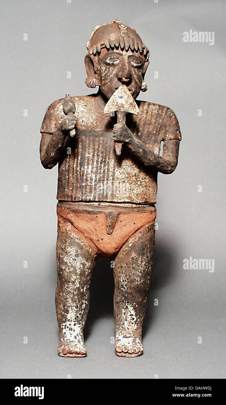 This standing male figure is a fine example of ancient sculpture ...