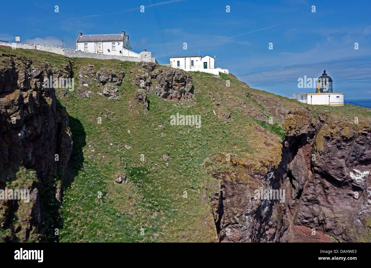 St. Abb's Head Lighthouse by St. Abbs in East Lothian Scotland facing the North Sea Stock Photo ...