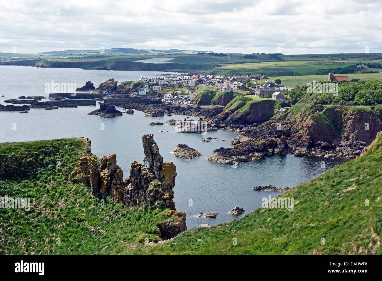 The small fishing village and harbour St. Abbs in East Lothian Scotland ...
