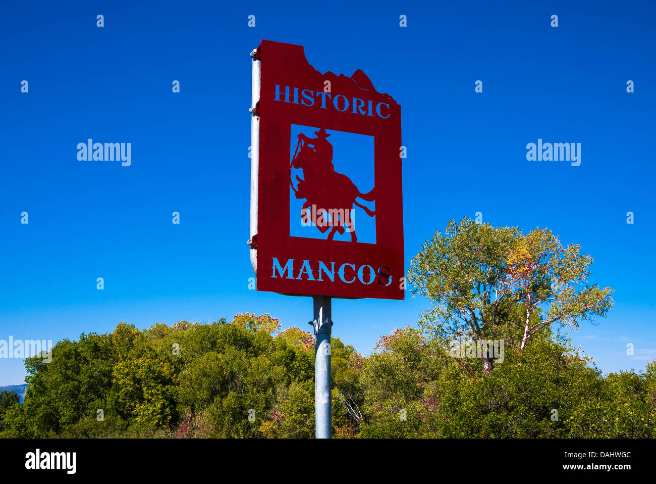 Cowboy town welcome sign, Mancos, Colorado USA Stock Photo - Alamy