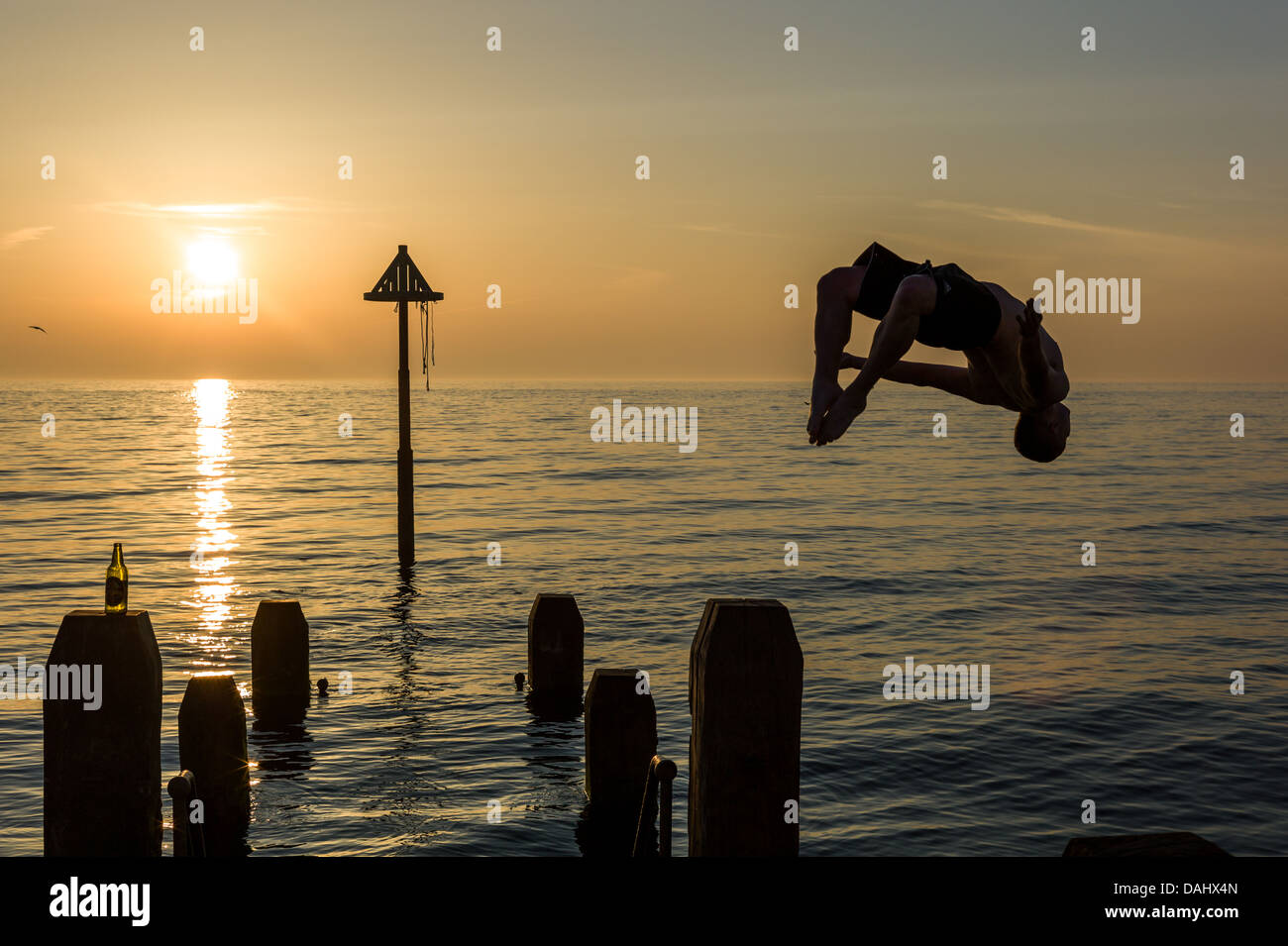Swimmer diving backwards hi-res stock photography and images - Alamy