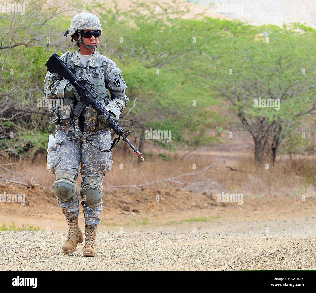 U.S. Army Spc. Wilma Orozco conducts a patrol while attending the ...