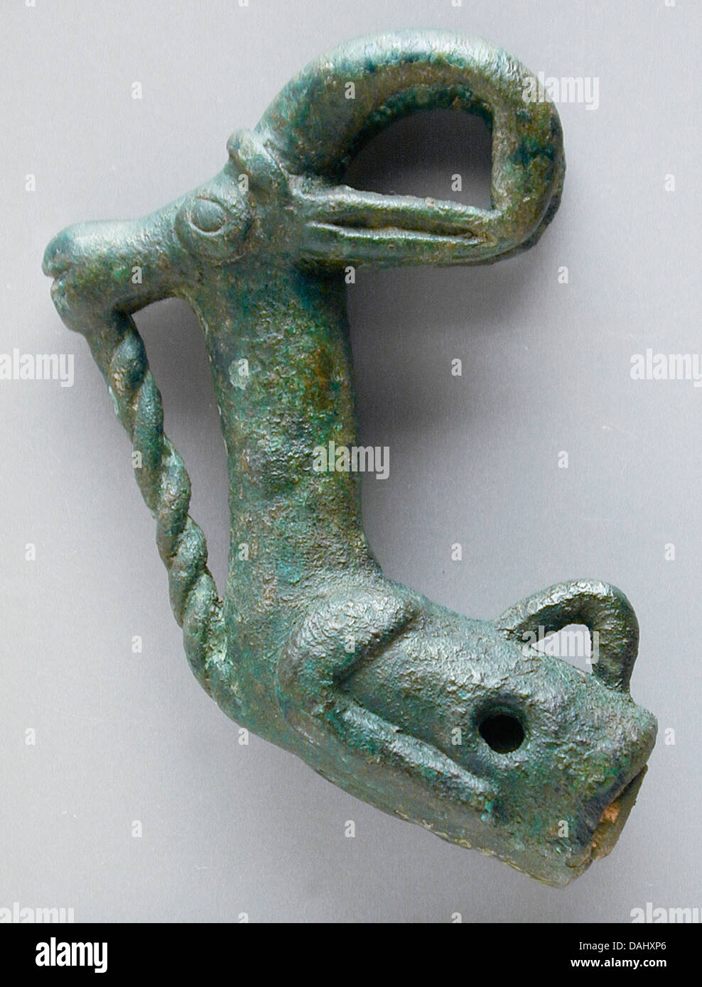 This whetstone socket is an ancient tool used for sharpening. Its ...