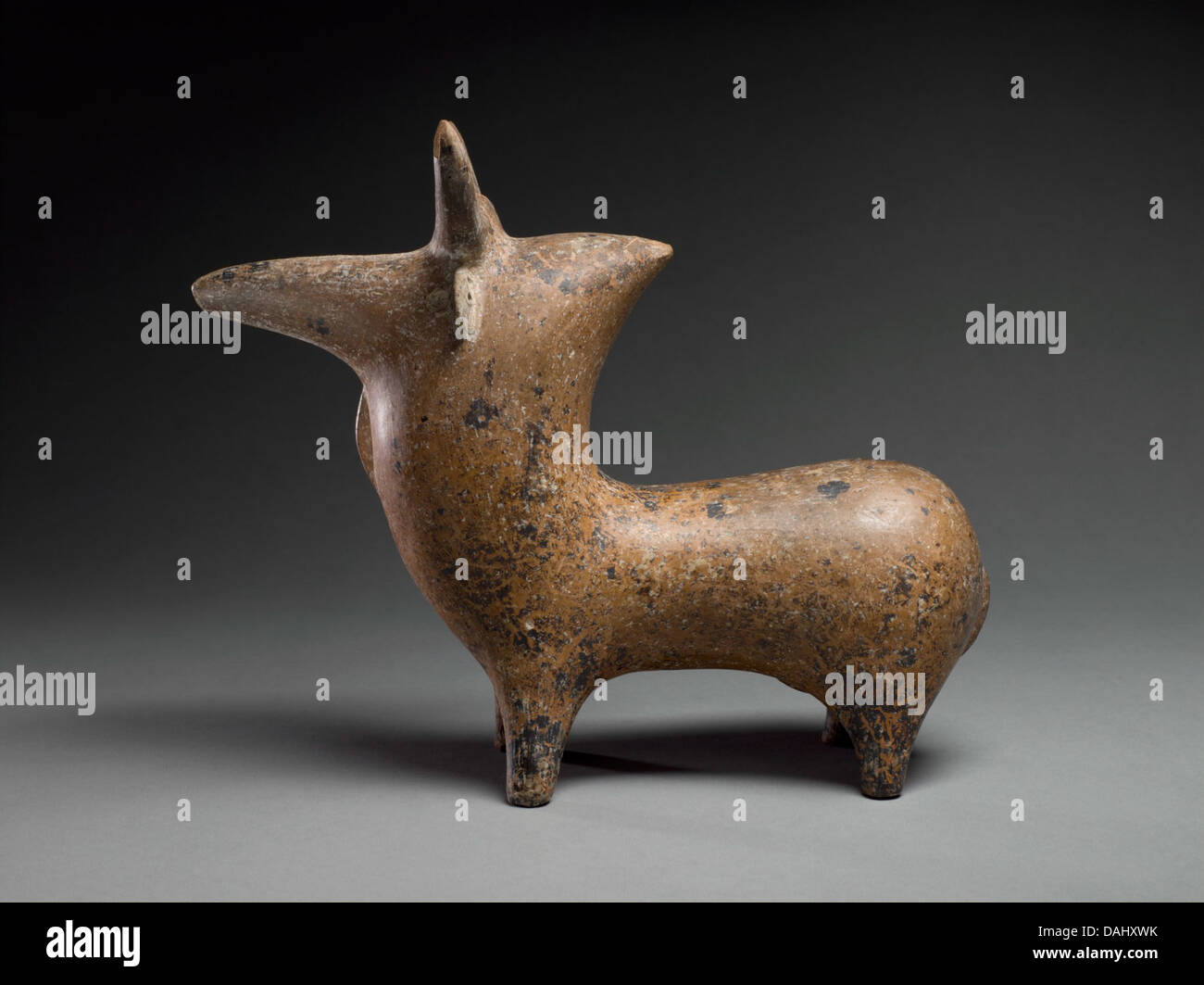 A zoomorphic vessel shaped like a bull, showcasing ancient artistic ...