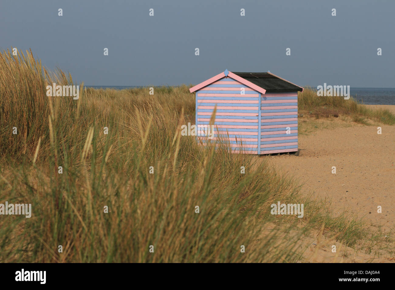Scroby beach huts, striped beach huts, Norfolk, UK Stock Photo - Alamy