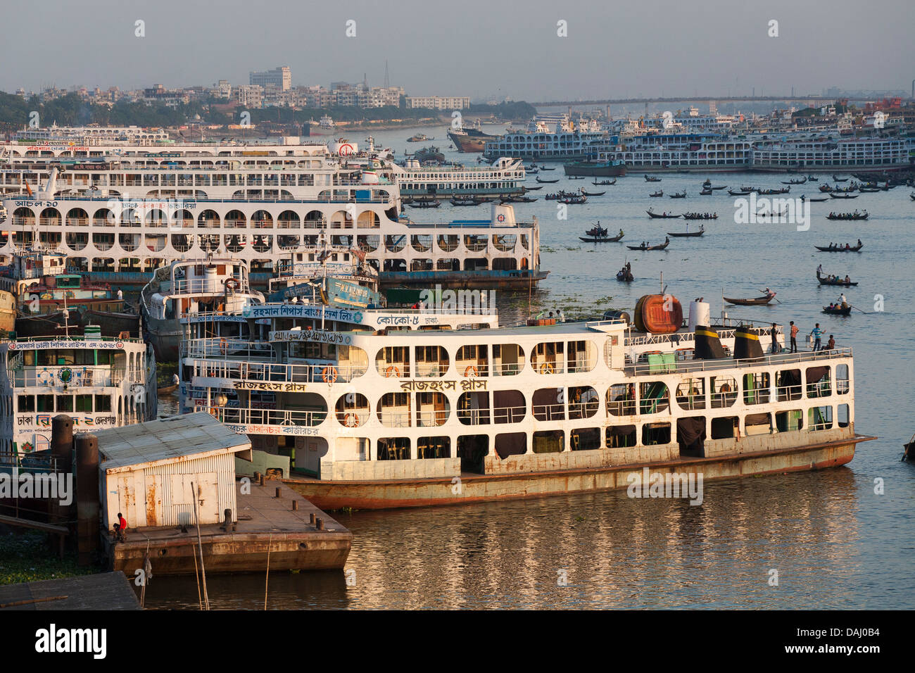 Fleets of long distance ferries or launches at Sadarghat and the ...