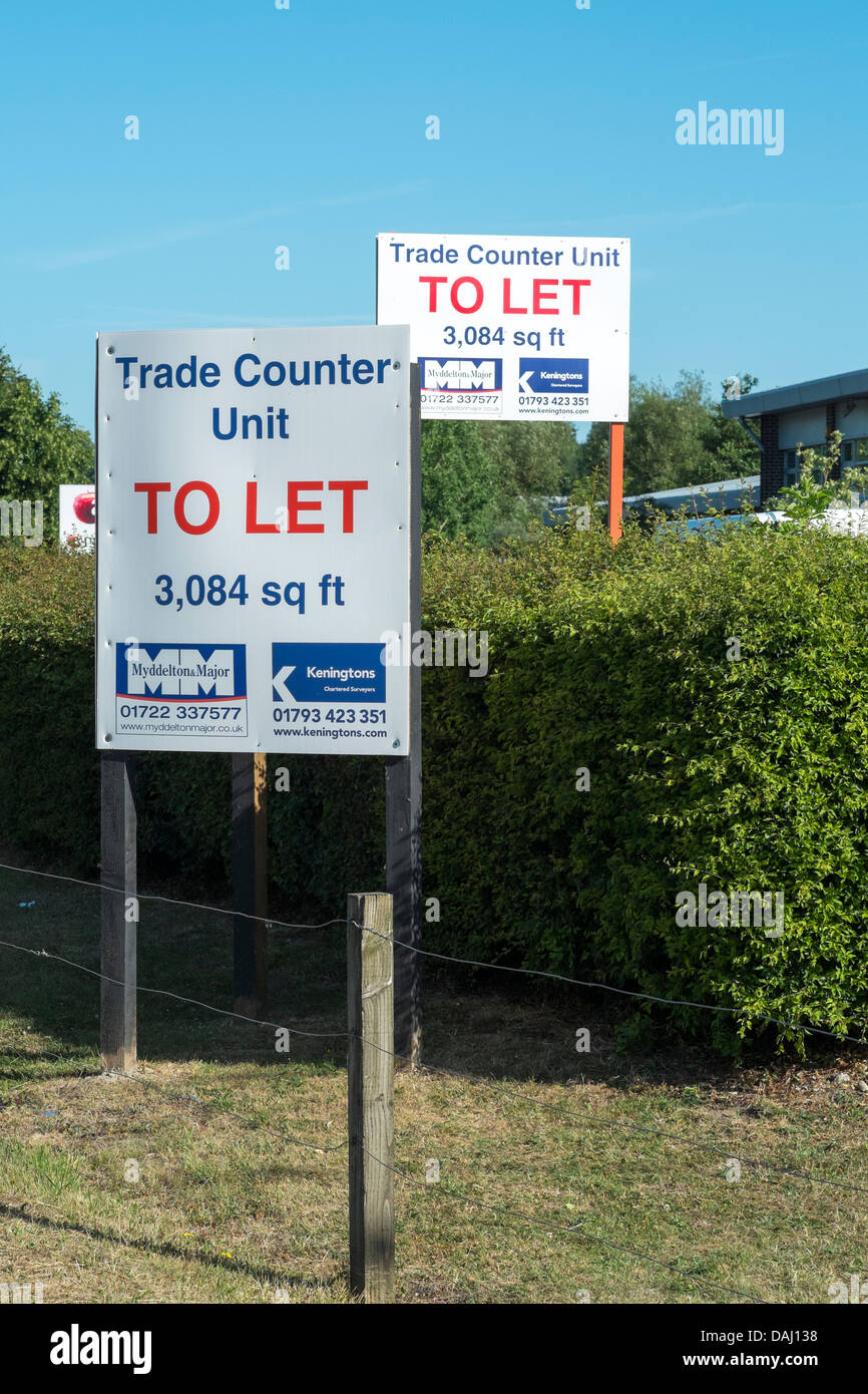 Commercial property to let signs Stock Photo - Alamy