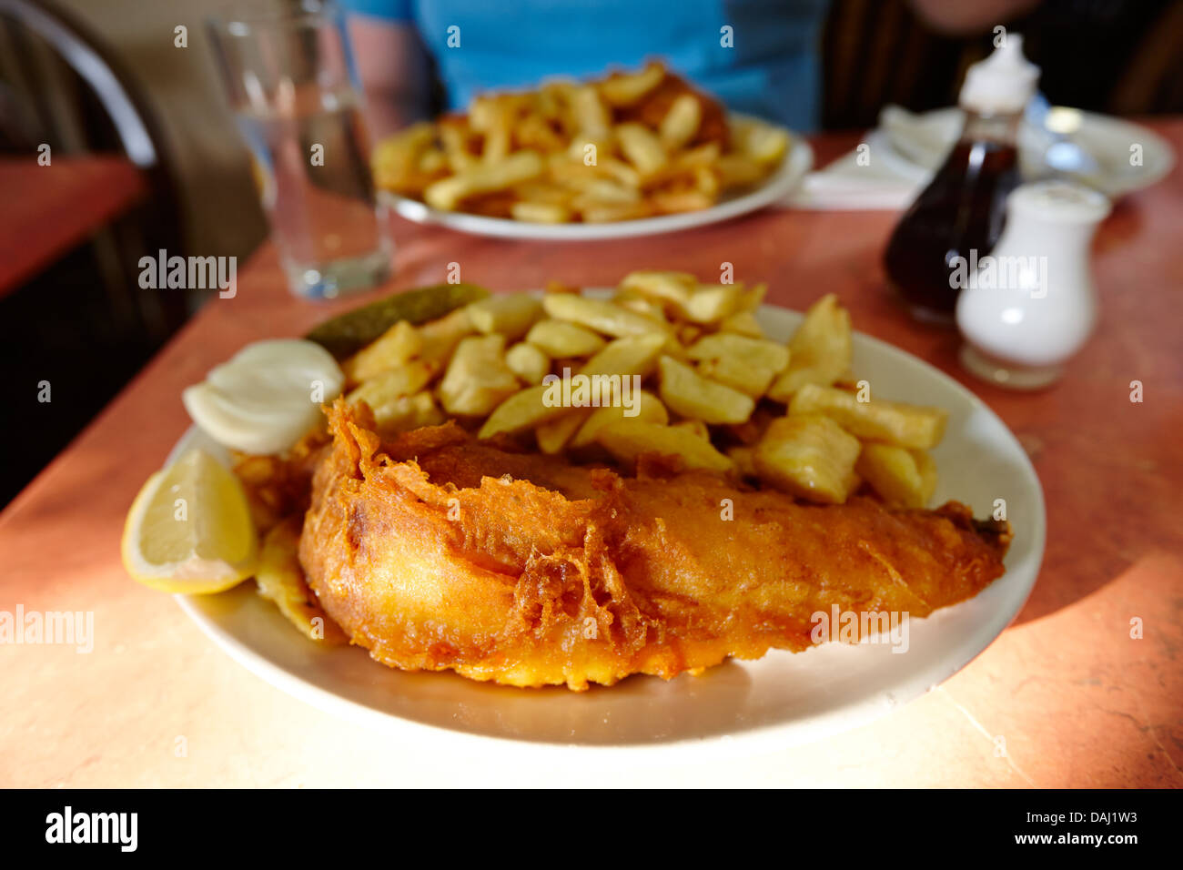 cod fish and chips in a restaurant in london, england uk Stock Photo ...