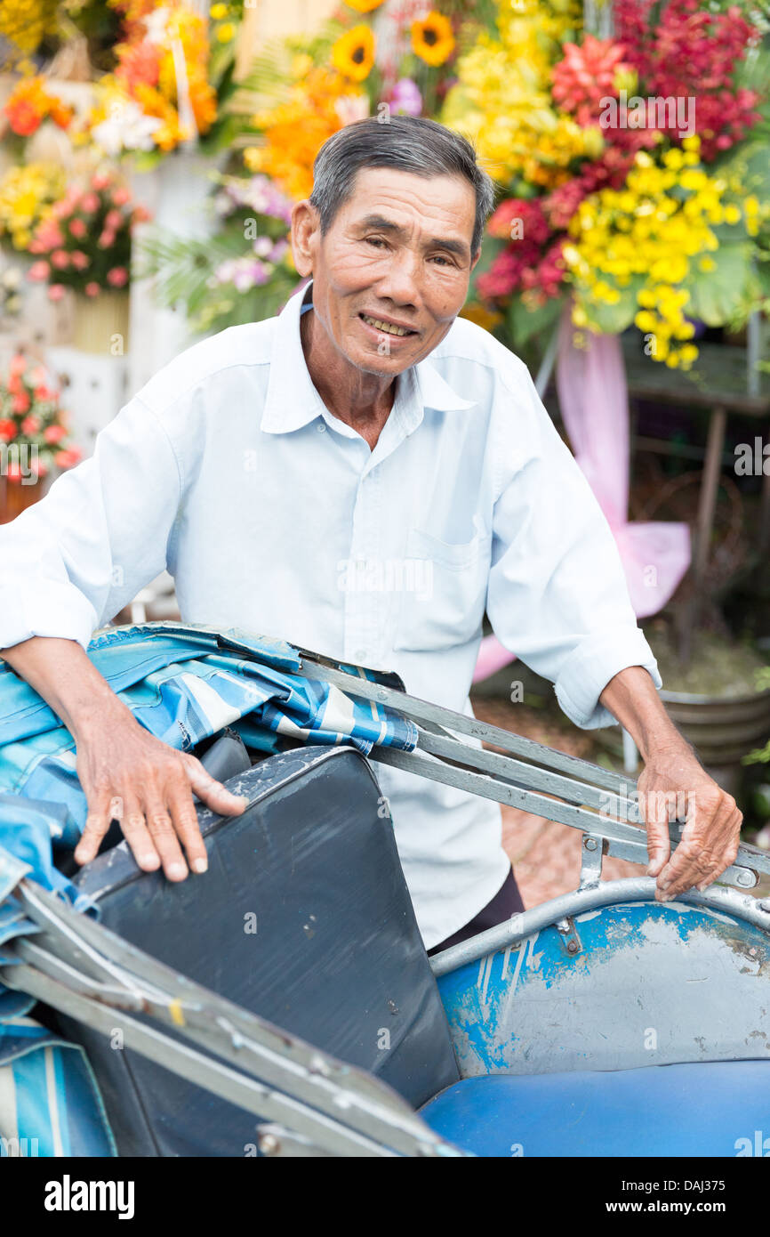 Portrait of a Cyclo Driver Stock Photo - Alamy