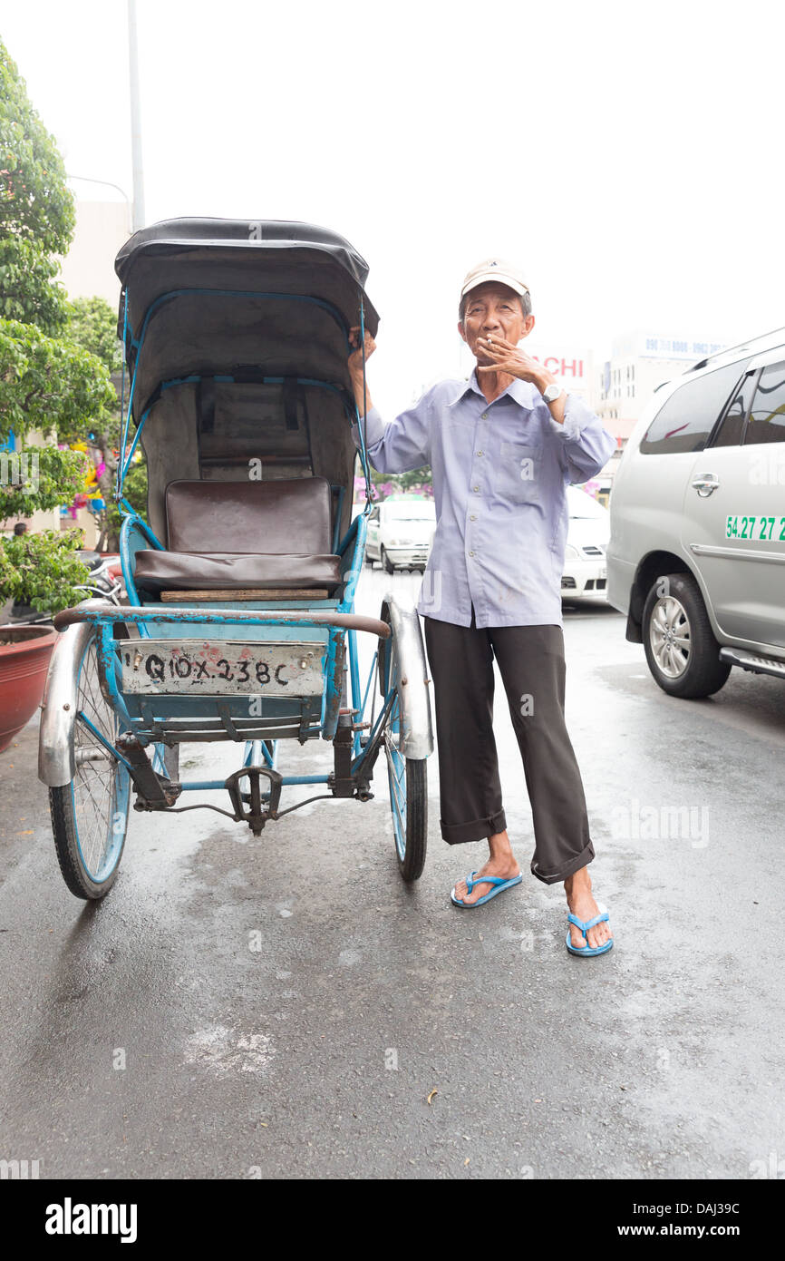 Portrait of a Cyclo Driver Stock Photo - Alamy