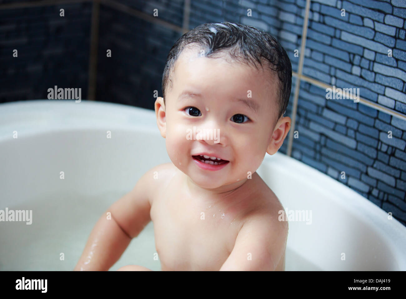 Baby asian happy hi-res stock photography and images - Alamy