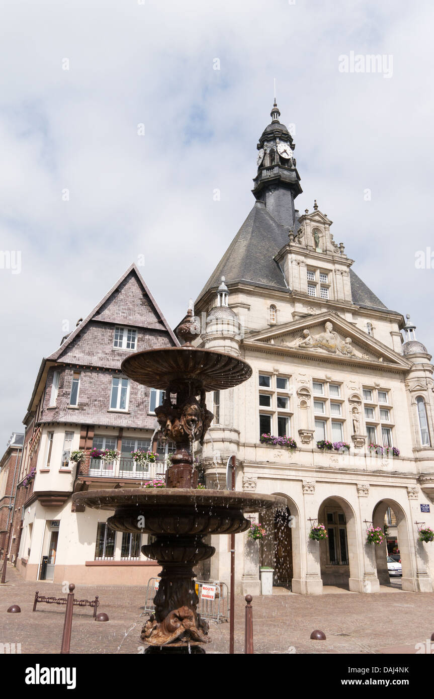 Fountain and town hall or Hotel de Ville, in Peronne, northern France ...