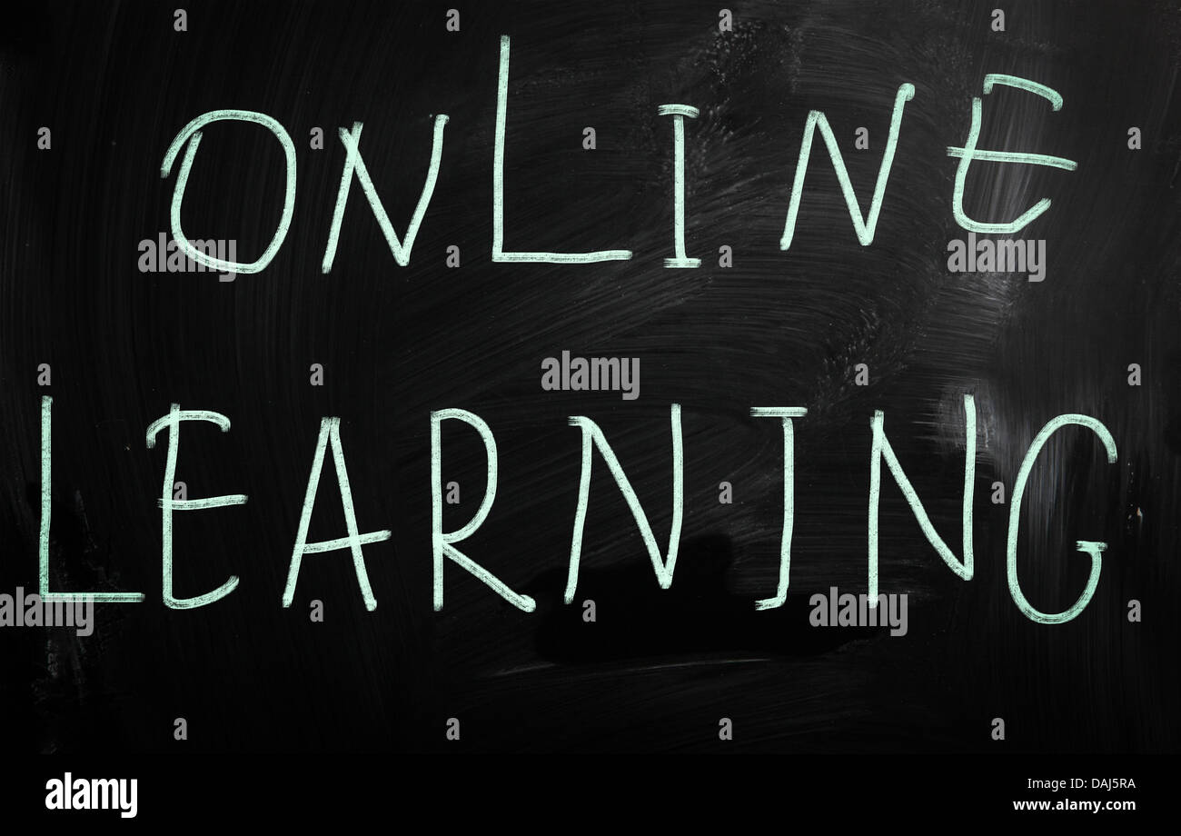Learn online handwritten with white chalk on a blackboard Stock Photo ...