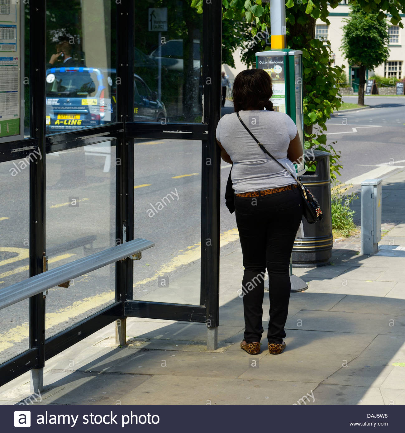 Woman Bus Stop Queue High Resolution Stock Photography and Images - Alamy