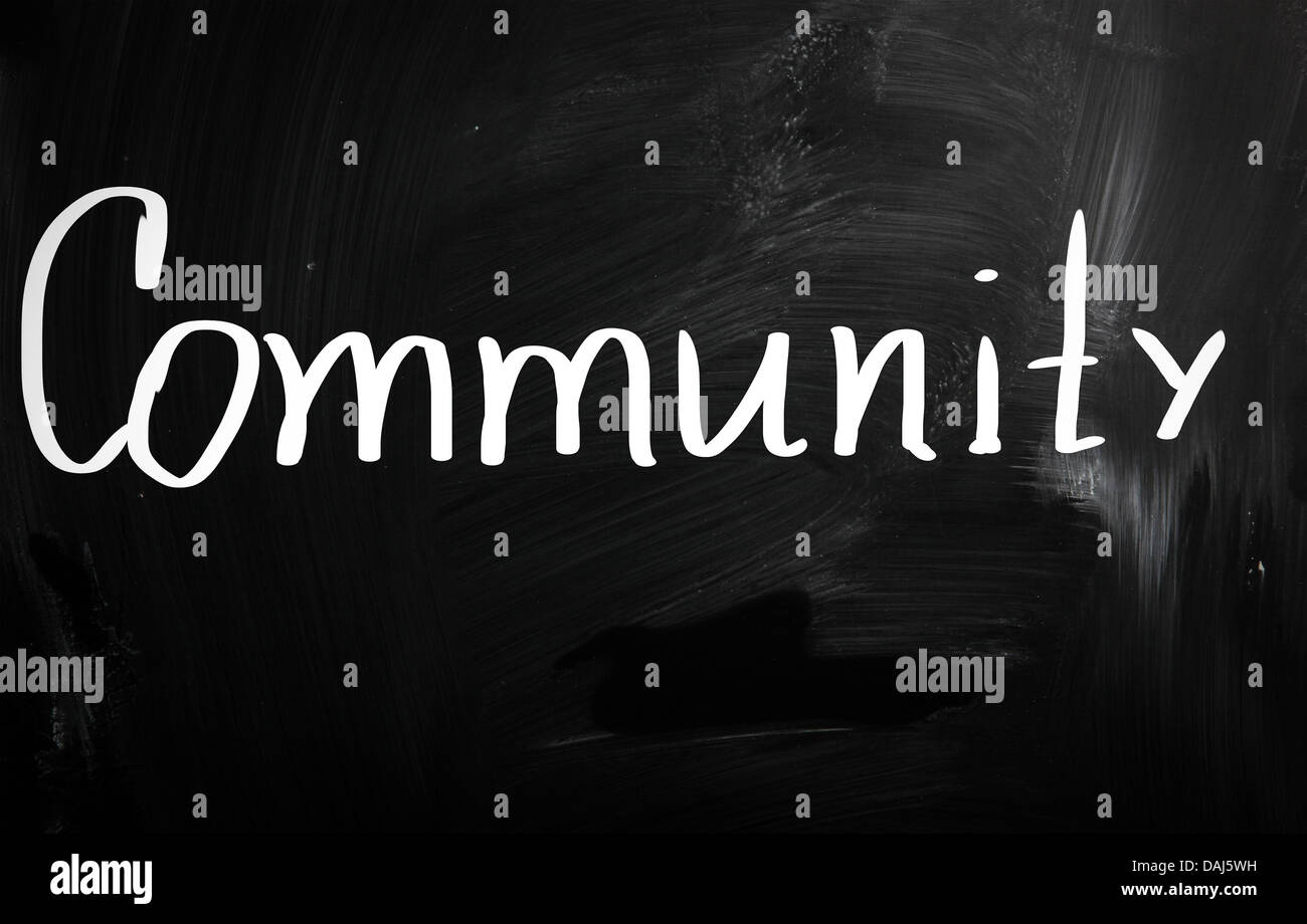 Community handwritten with white chalk on a blackboard Stock Photo - Alamy