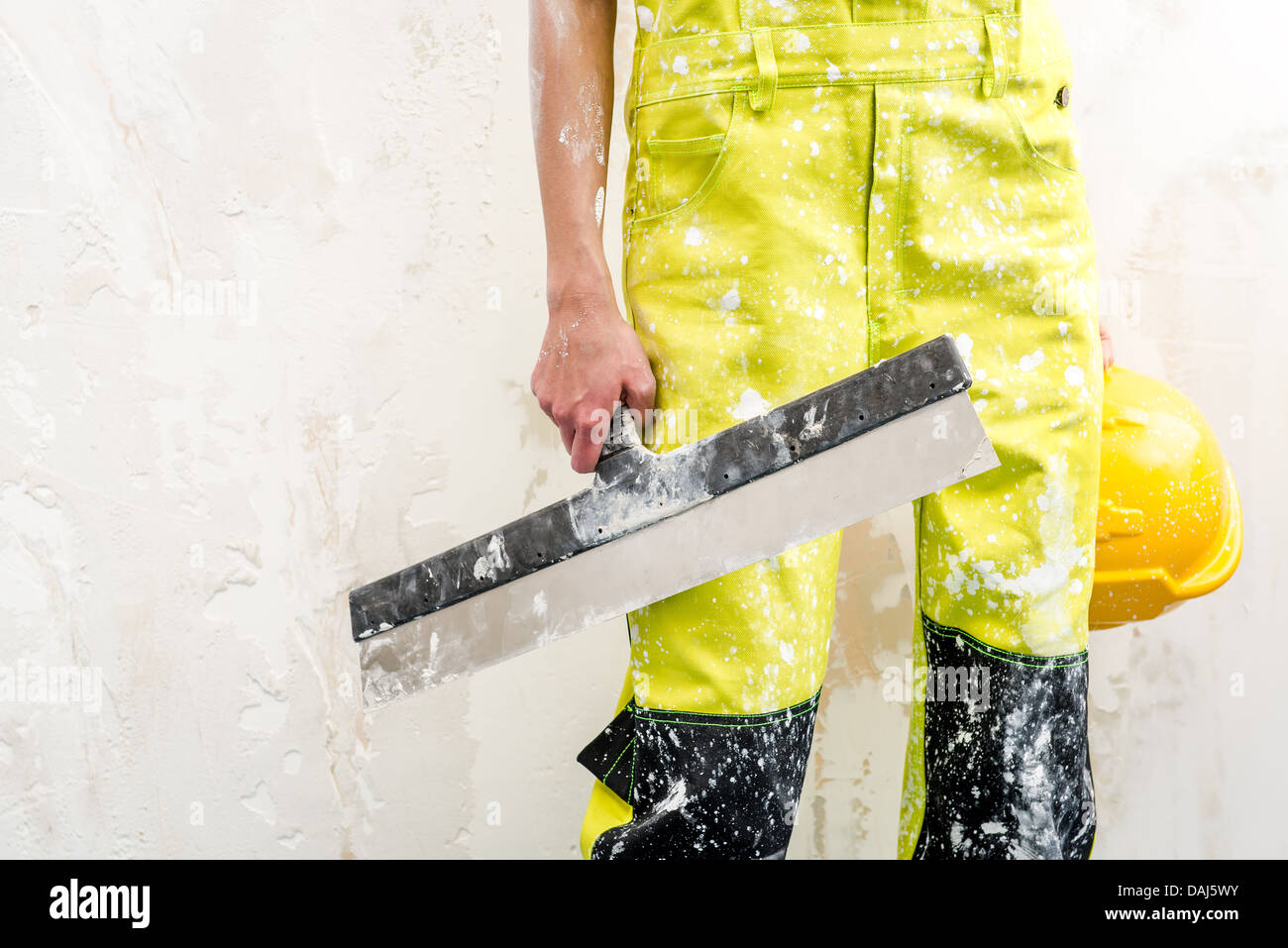 Worker putty knife hi-res stock photography and images - Alamy