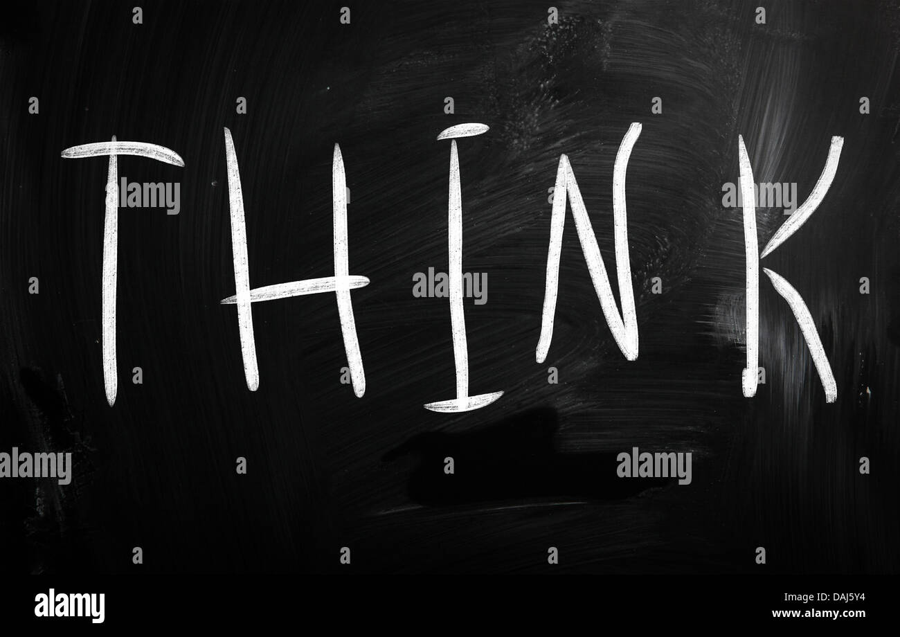The word "Think" handwritten with white chalk on a blackboard Stock ...