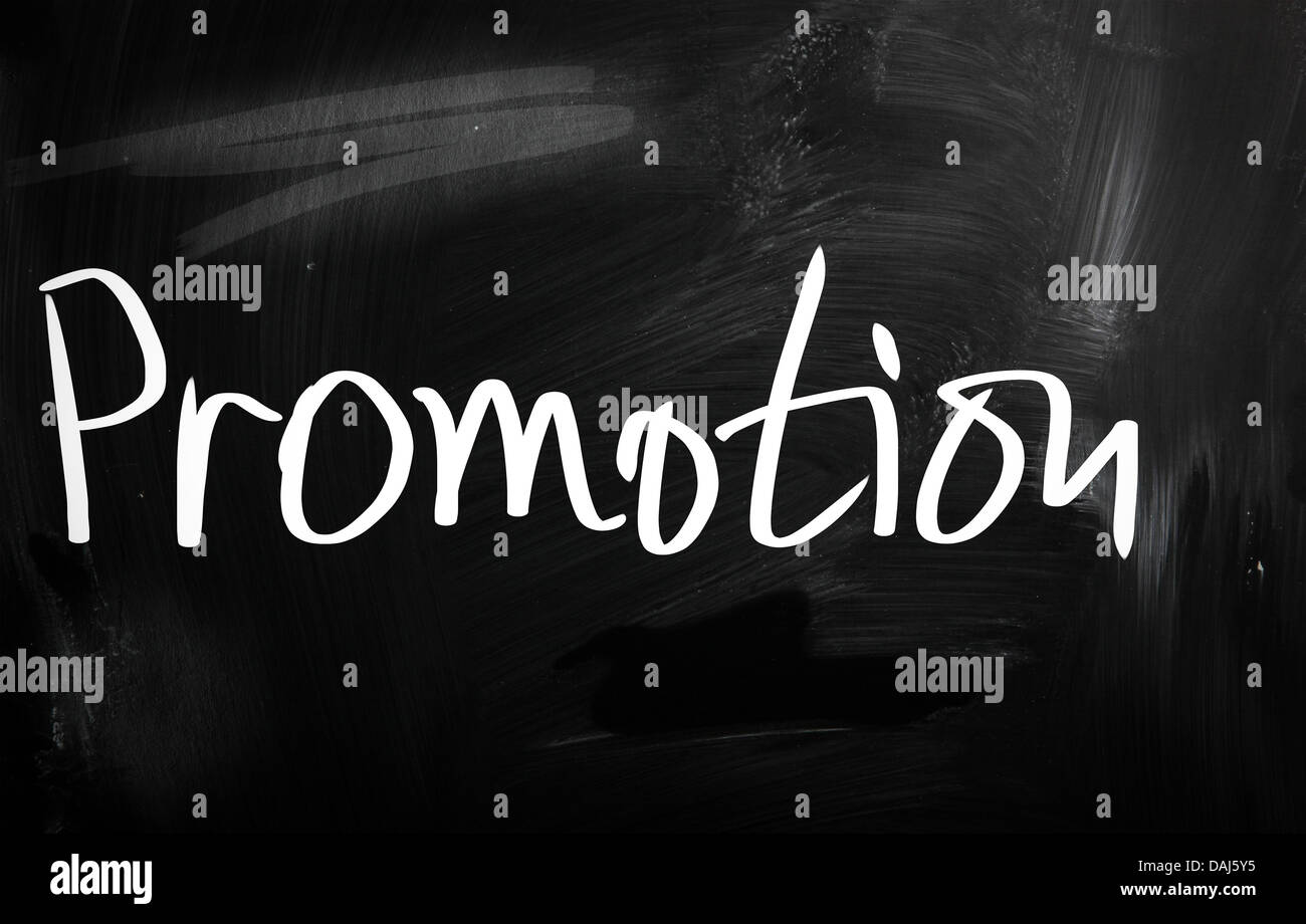 The word "promotion" handwritten with white chalk on a blackboard Stock ...