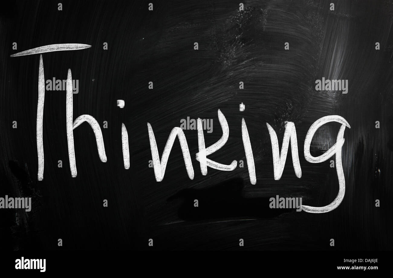 The word "Thinking" handwritten with white chalk on a blackboard Stock ...