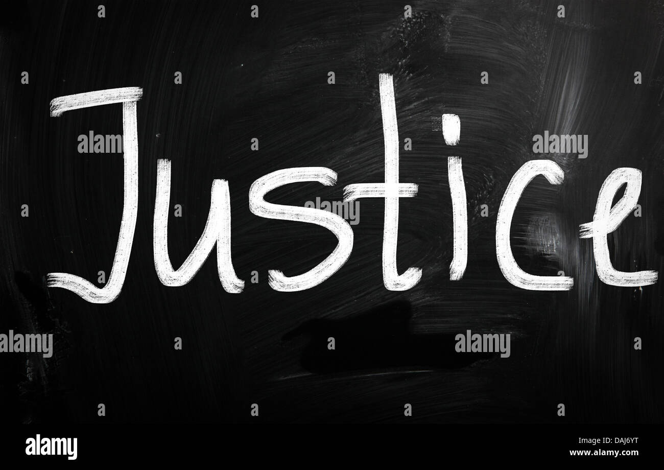 The word "Justice" handwritten with white chalk on a blackboard Stock ...