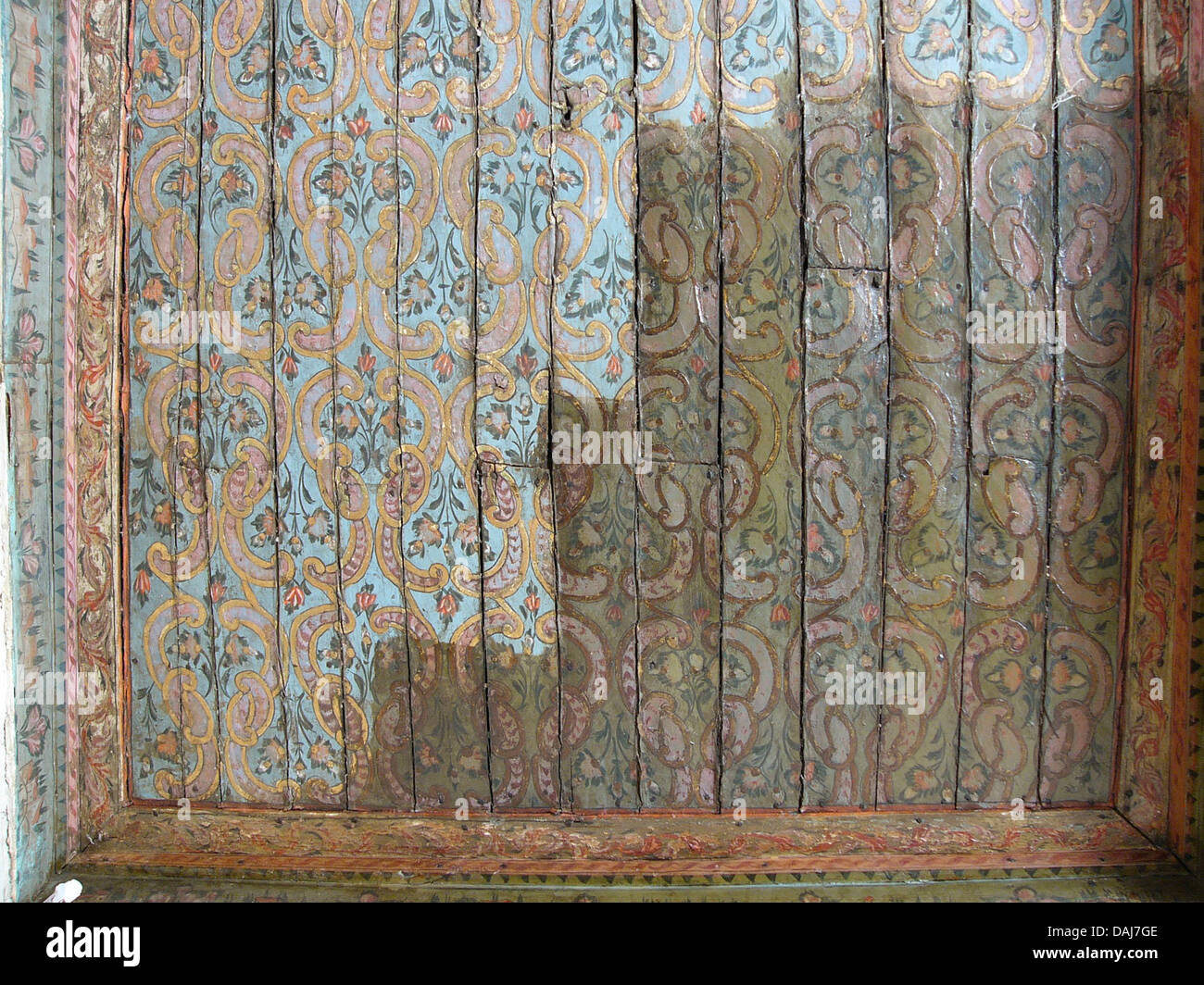 The picture shows a close-up of the wood panelling of a Damascus Room ...