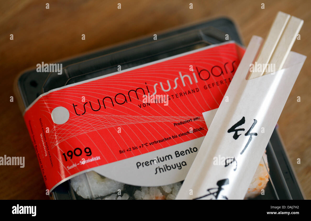 The picture shows a package of 'Tsunami Sushi Bars' lying on a table in ...