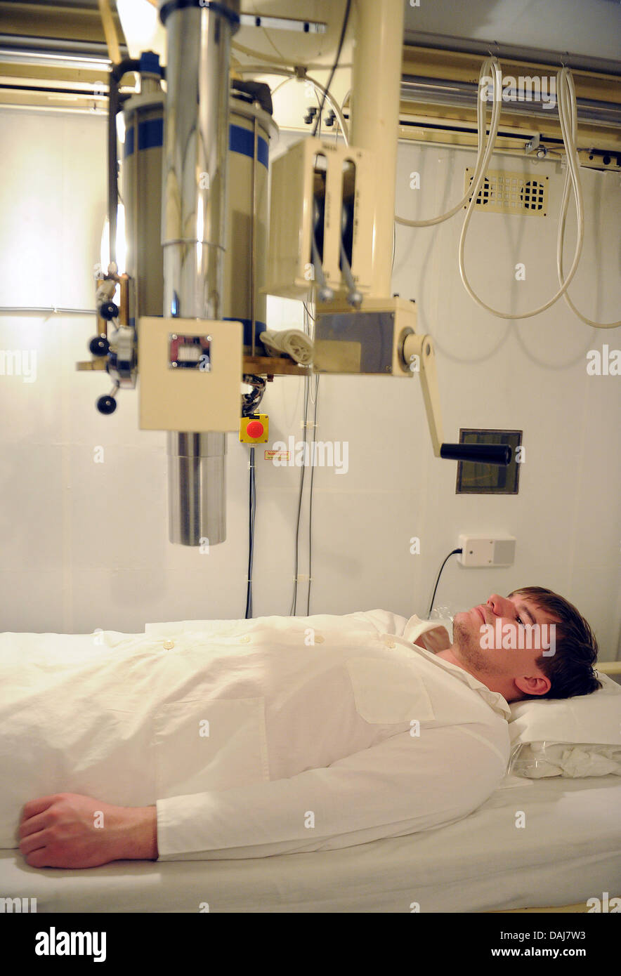 A person that has returned from Japan is examined on radiation exposure ...