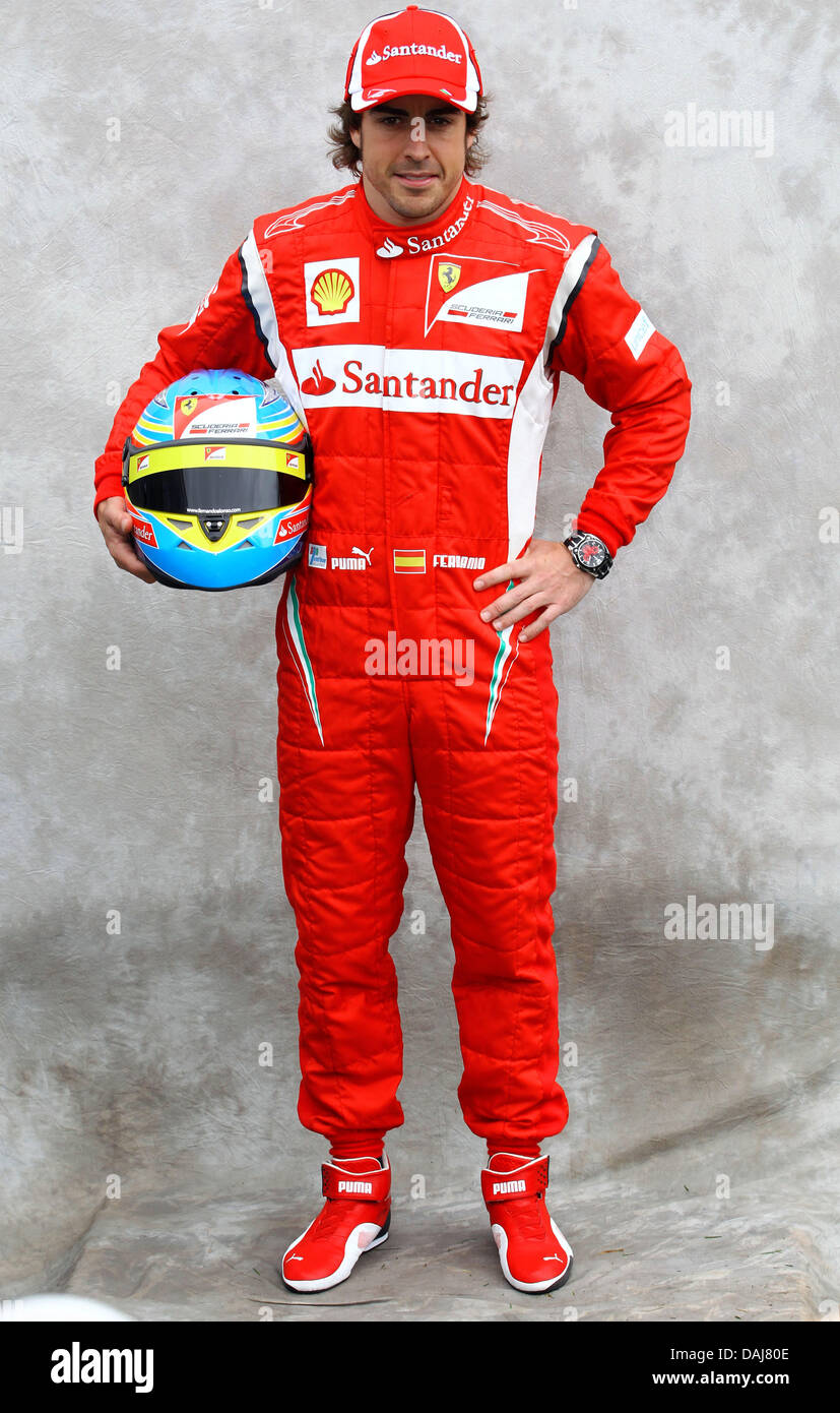 Spanish Formula One race driver Fernando Alonso of Ferrari smiles ...