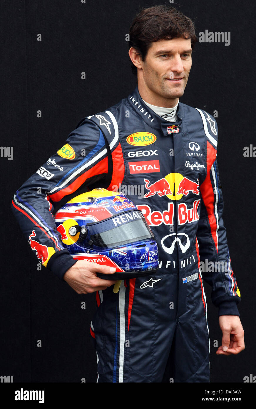 Australian Formula One driver Mark Webber of Red Bull Racing smiles ...