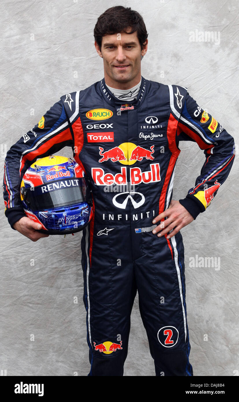 Australian Formula One driver Mark Webber of Red Bull Racing smiles ...