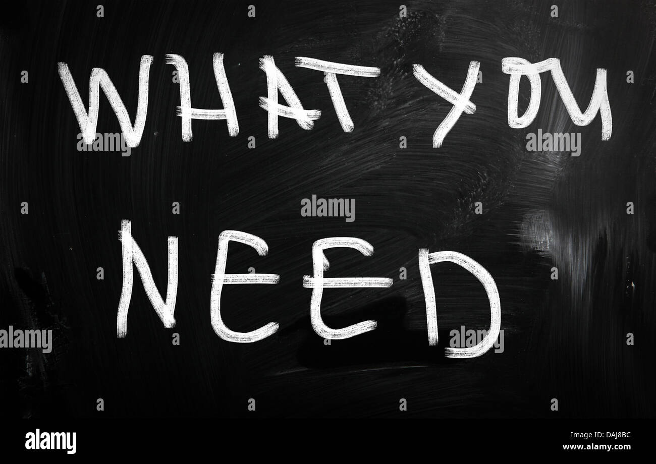 What you need handwritten with white chalk on a blackboard Stock Photo ...