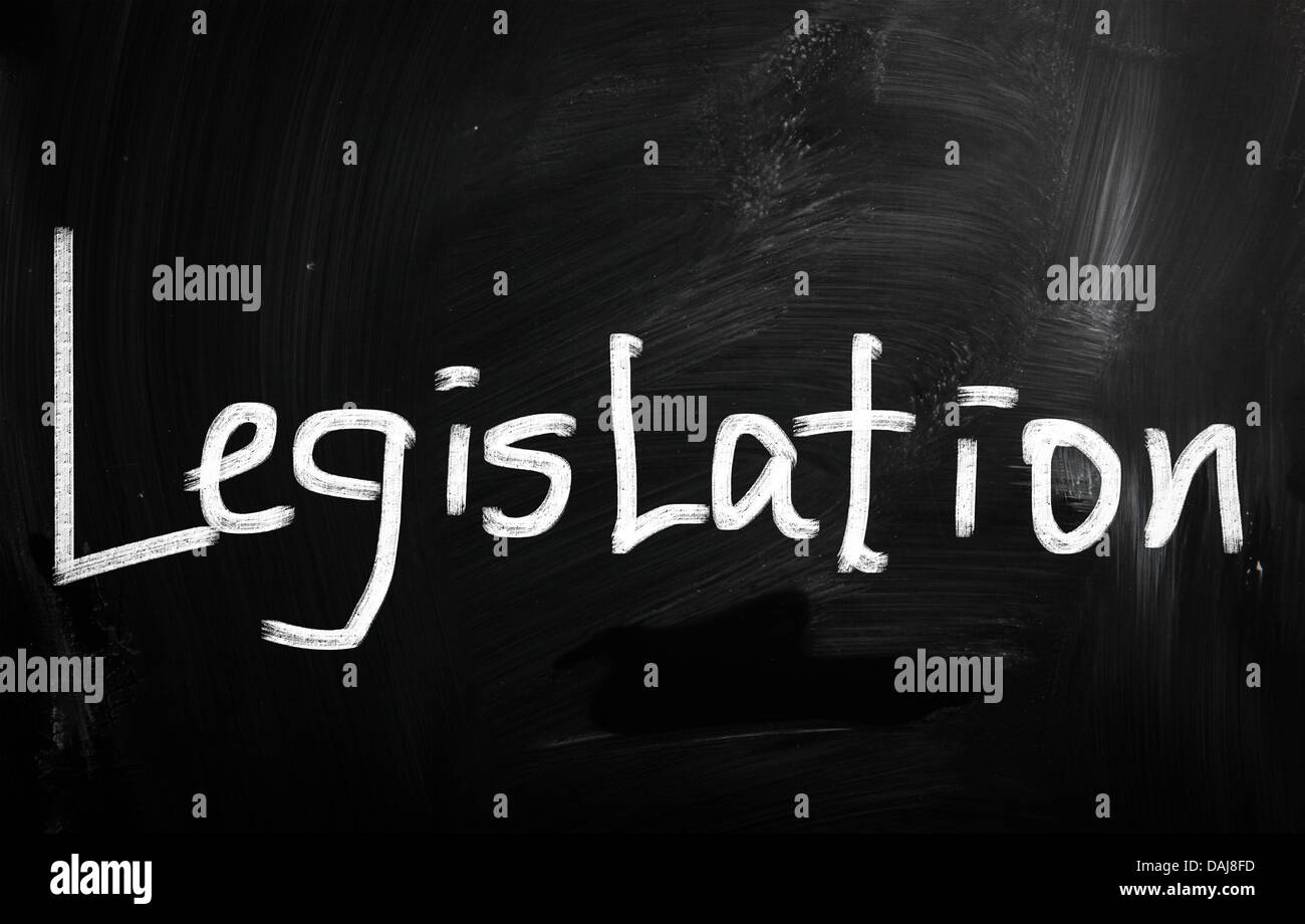 Legislation handwritten with white chalk on a blackboard Stock Photo ...