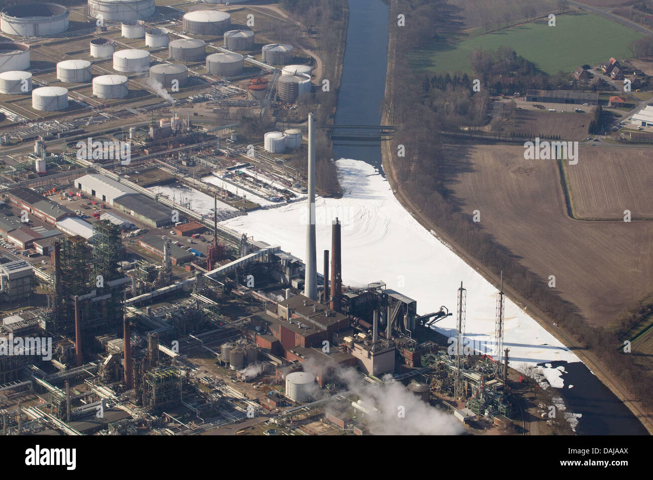 Aerial view on extinguishing foam covering the harbour basin of a BP ...