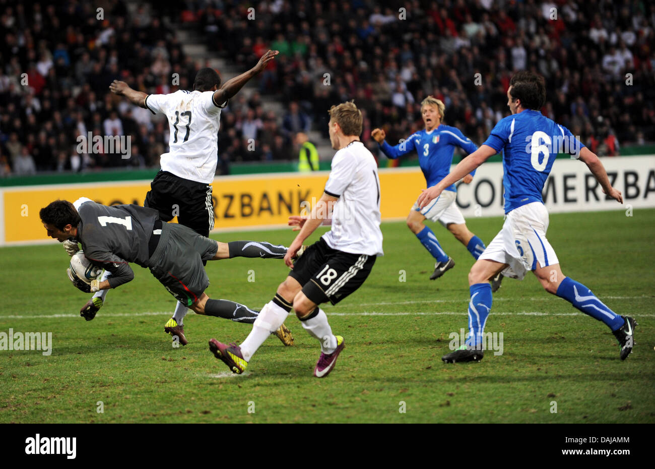 Italy's goalkeeper Carlo Pinsoglio (L-R) stops the ball against Germany ...