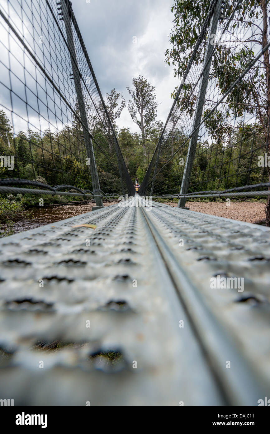 A swing bridge spans the spectacular Huon river Near Geeveston ...
