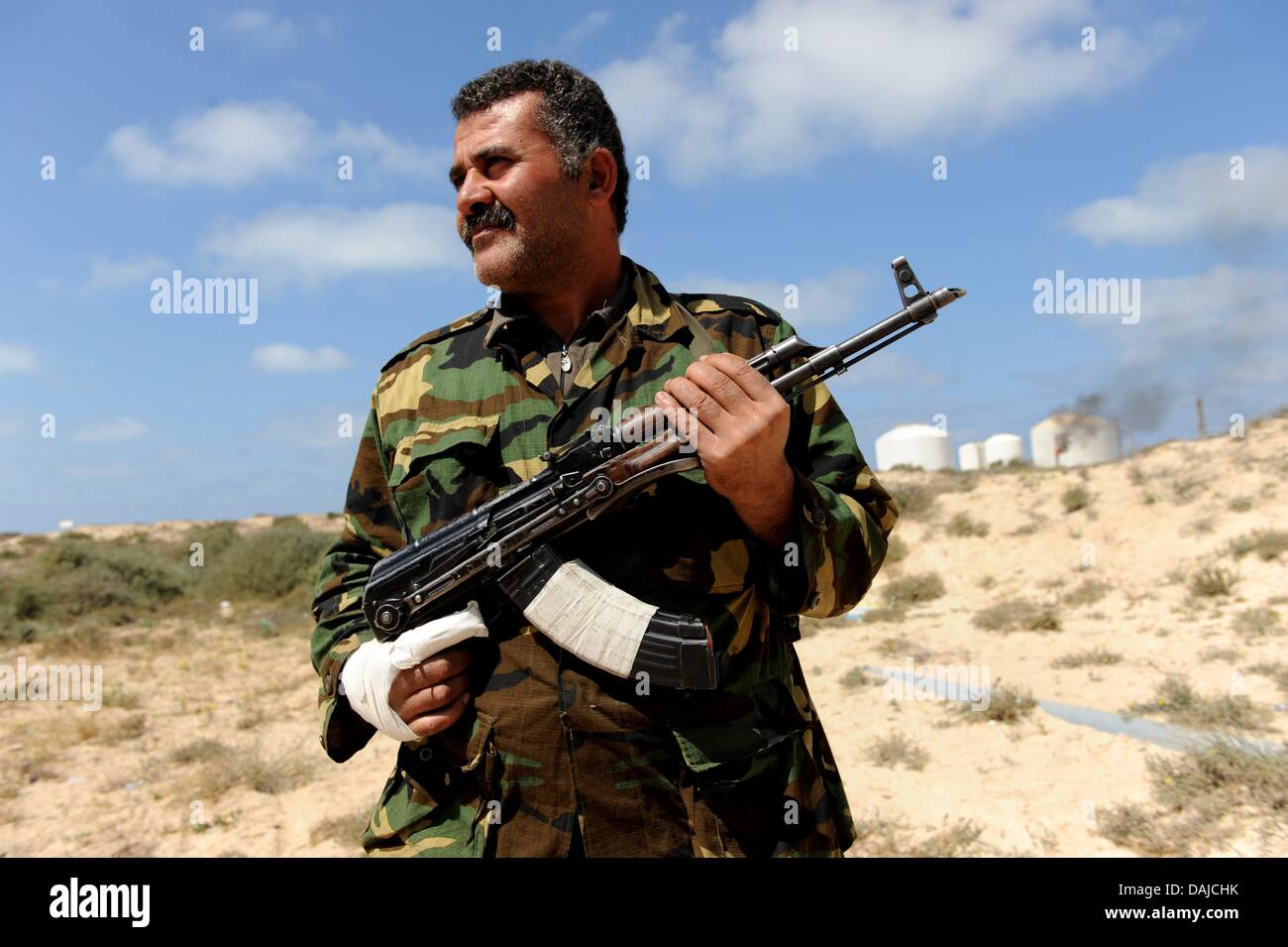 Libyan freedom fighters guard an oil terminal on the mediteranean coast ...