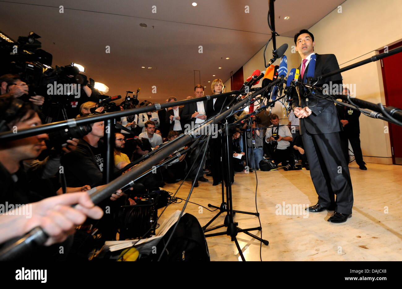 Health Minister of Germany Philipp Roesler talks to the press after the ...